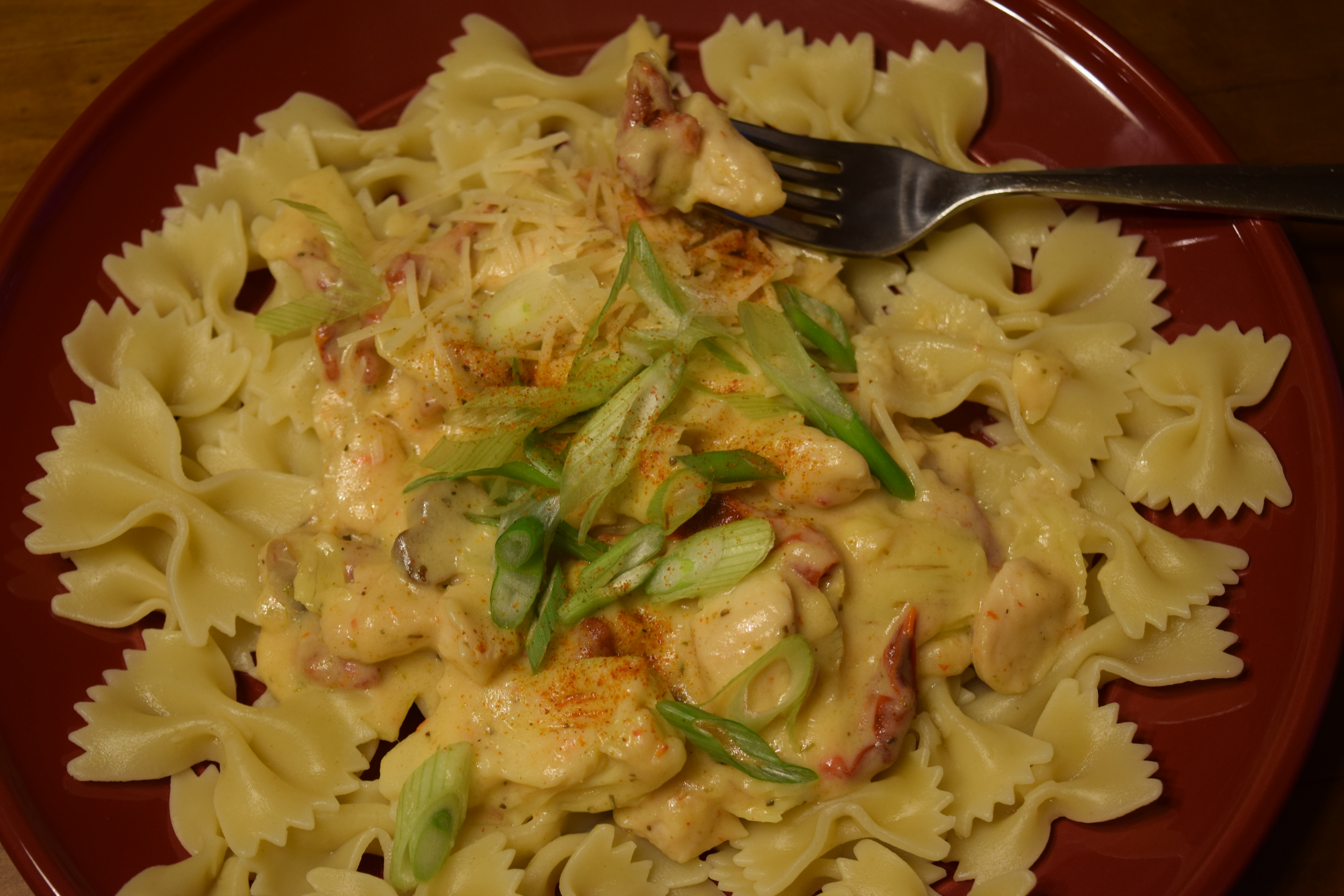 ArtichokePasta_PlatedAerialView | Four Sisters Dish
